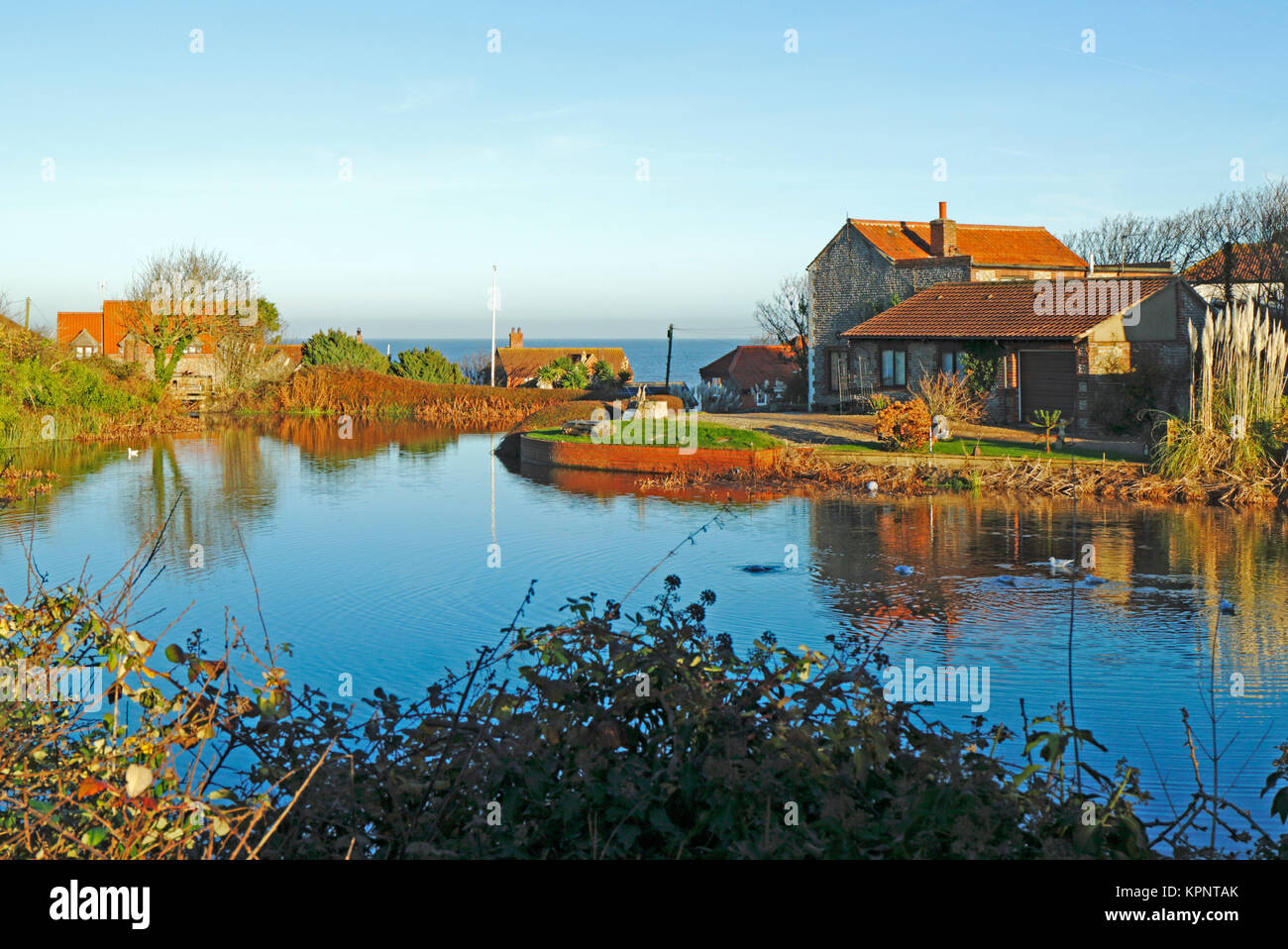 A view of the old mill pool at the North Norfolk resort of Mundesley-on ...