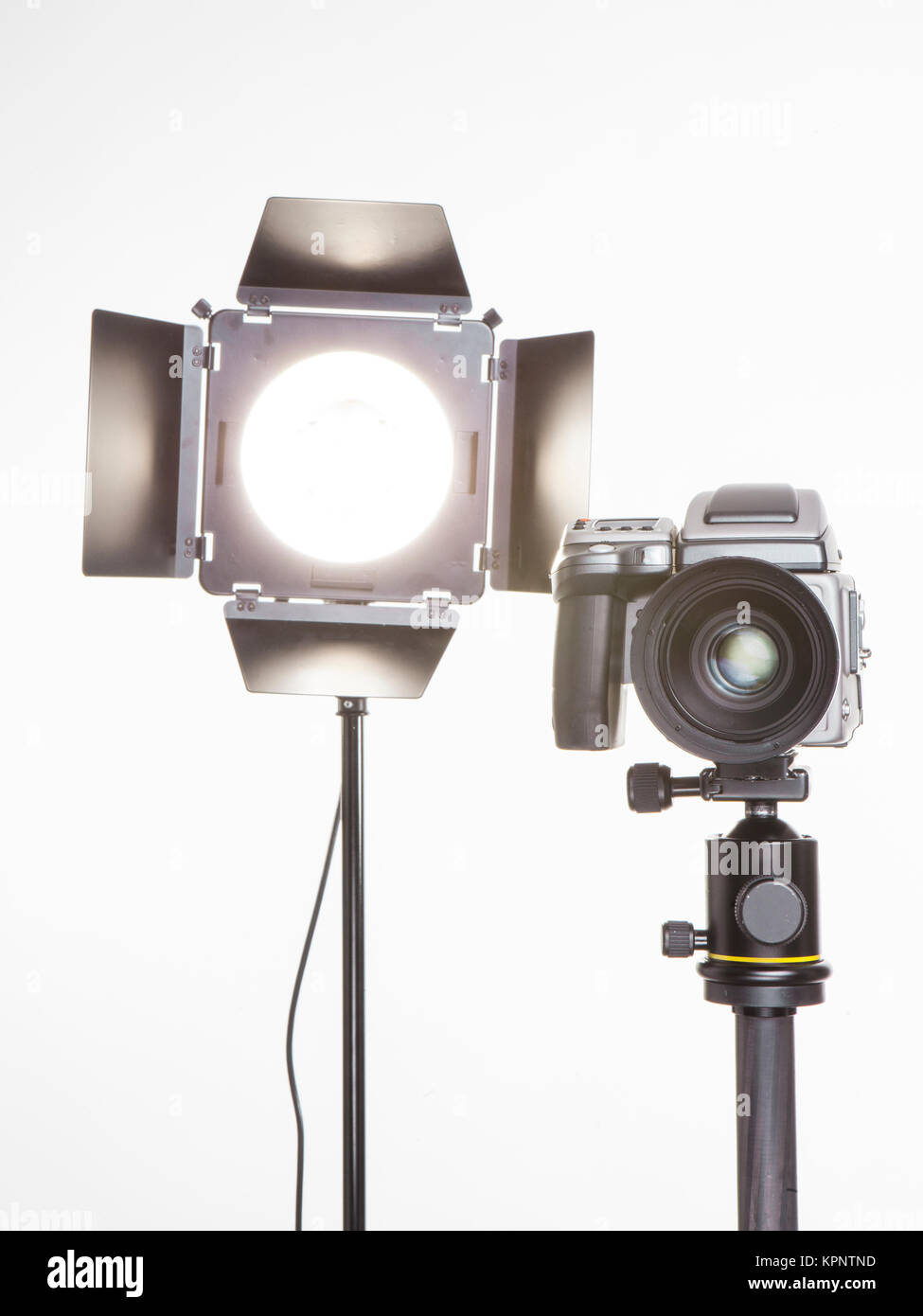 medium format proffesional camera and studio light with barn doors ...