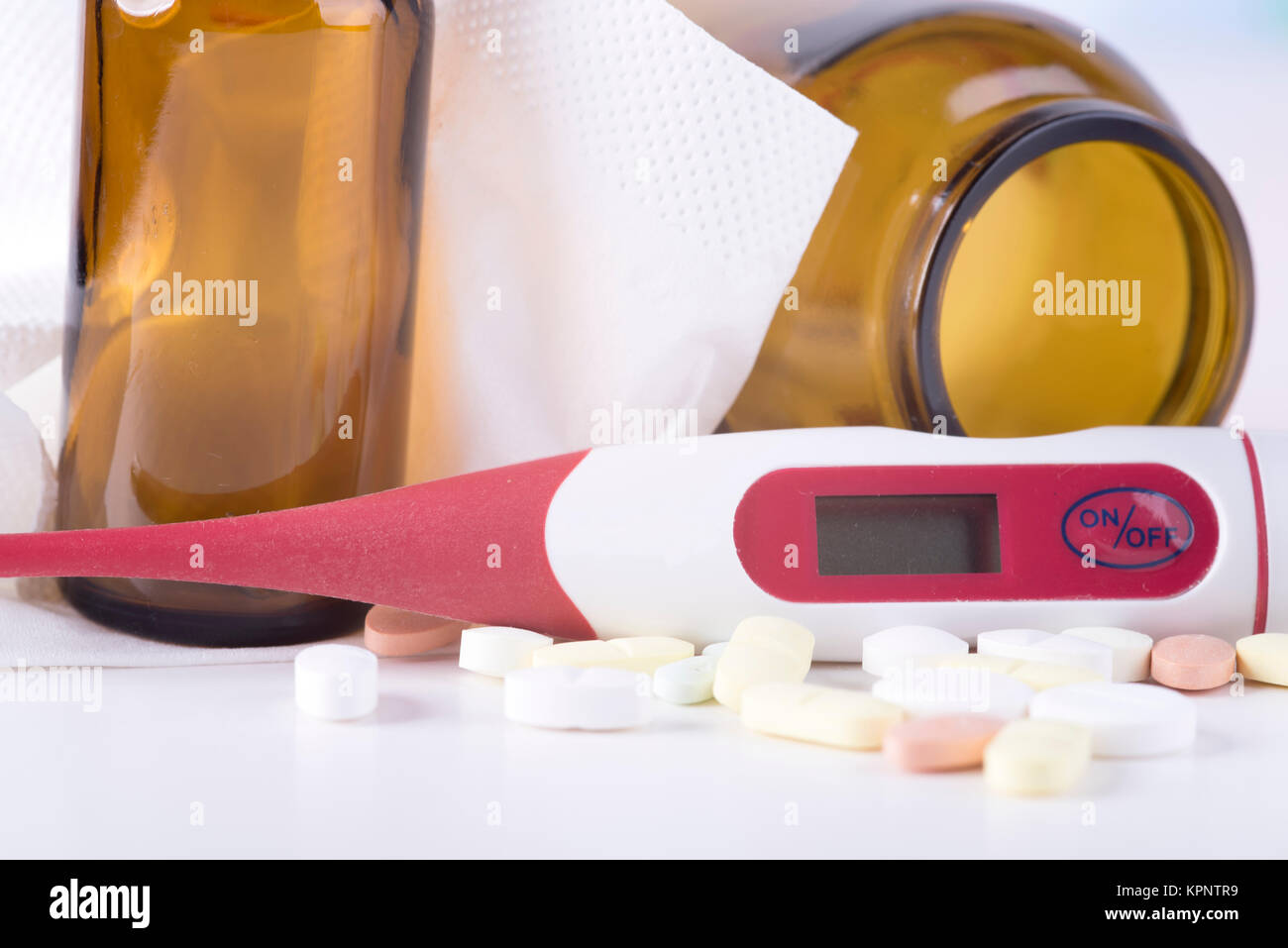 thermometer to measure fever and cure Stock Photo - Alamy