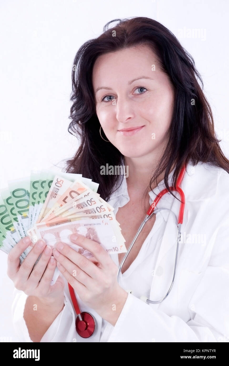 Model release , aerztin mit Geld - doctor with money Stock Photo - Alamy