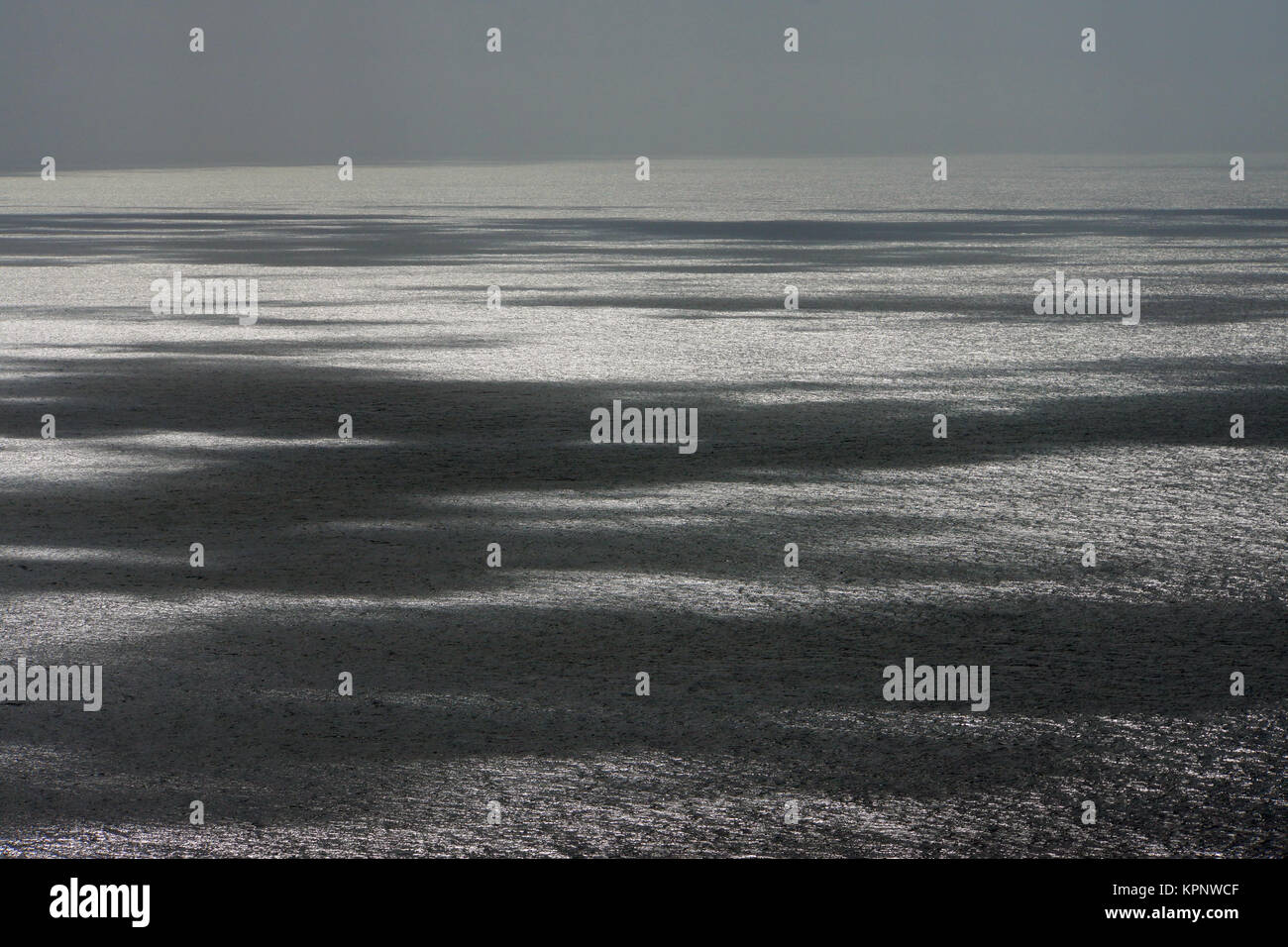 clouds cast their shadows on the ocean surface Stock Photo - Alamy