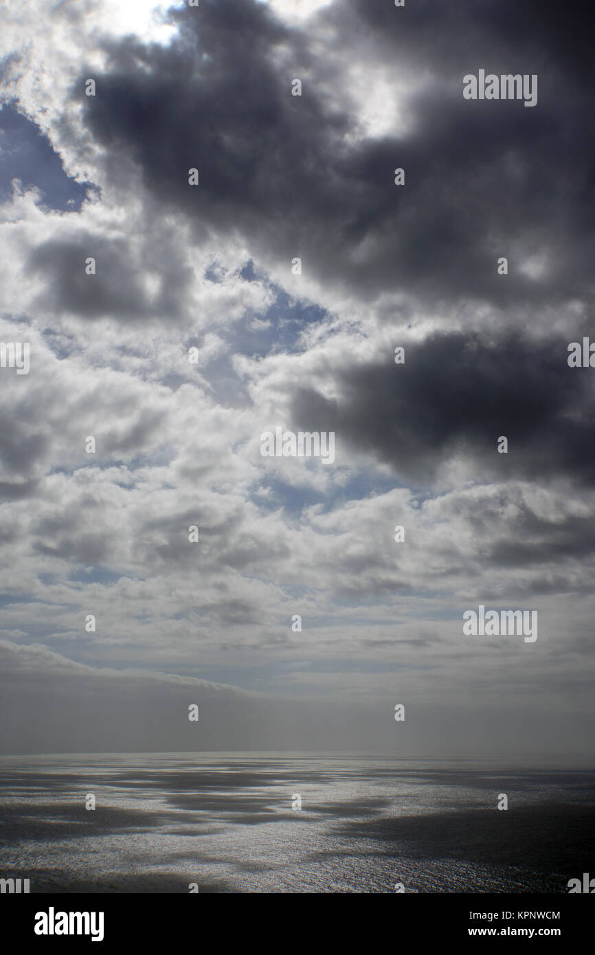 clouds cast their shadows on the ocean surface Stock Photo - Alamy