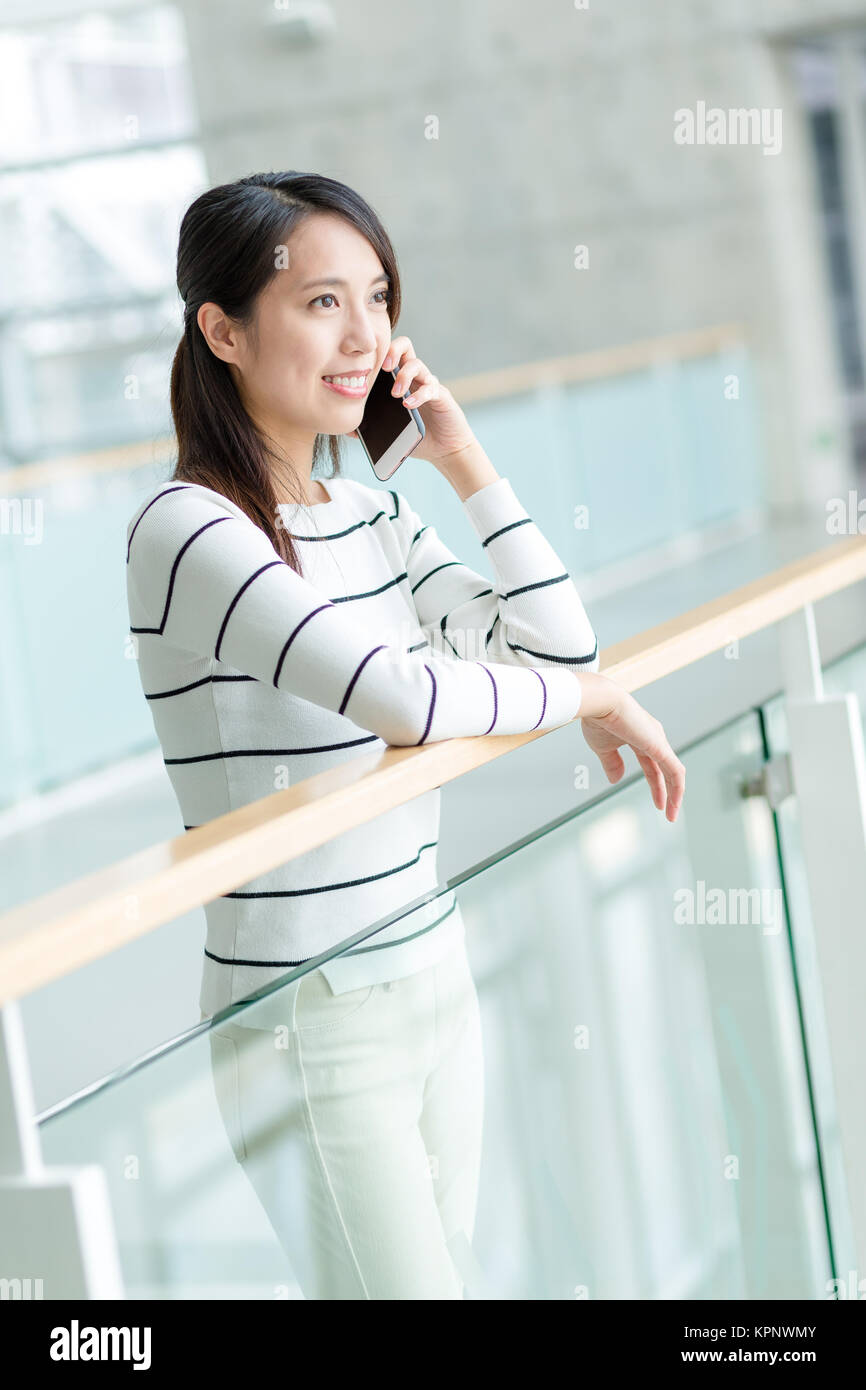 Woman talk on cellphone Stock Photo - Alamy