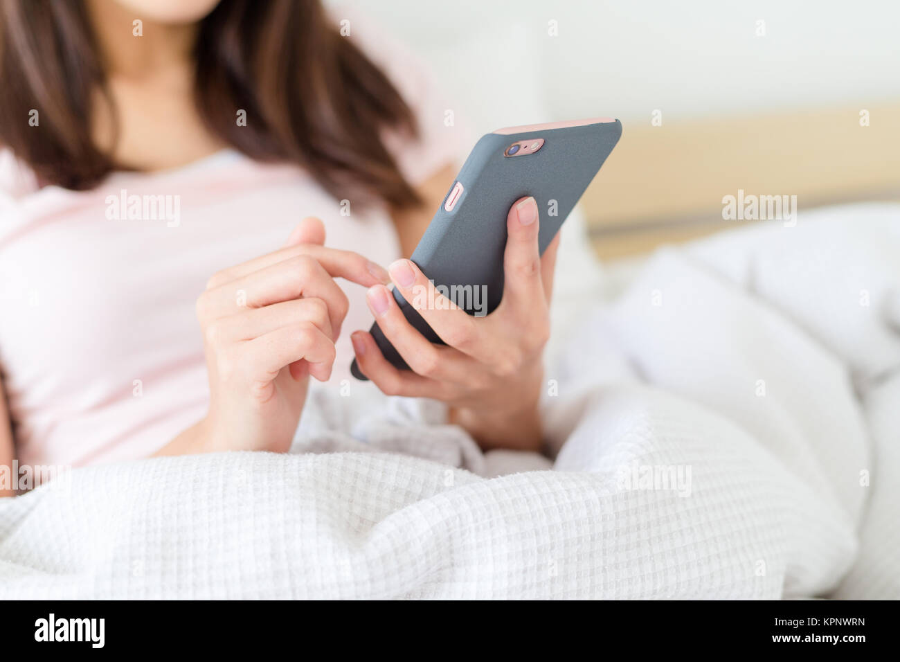Woman watch on cellphone Stock Photo - Alamy