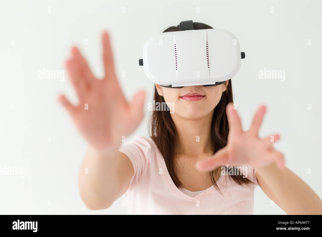 Woman using VR device Stock Photo - Alamy