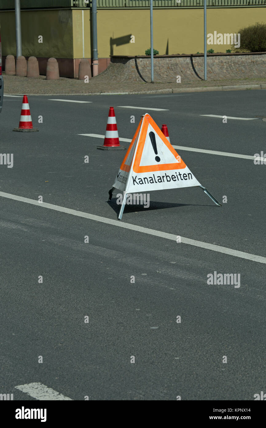 faltaufsteller or warning pyramid channel works on a road Stock Photo ...