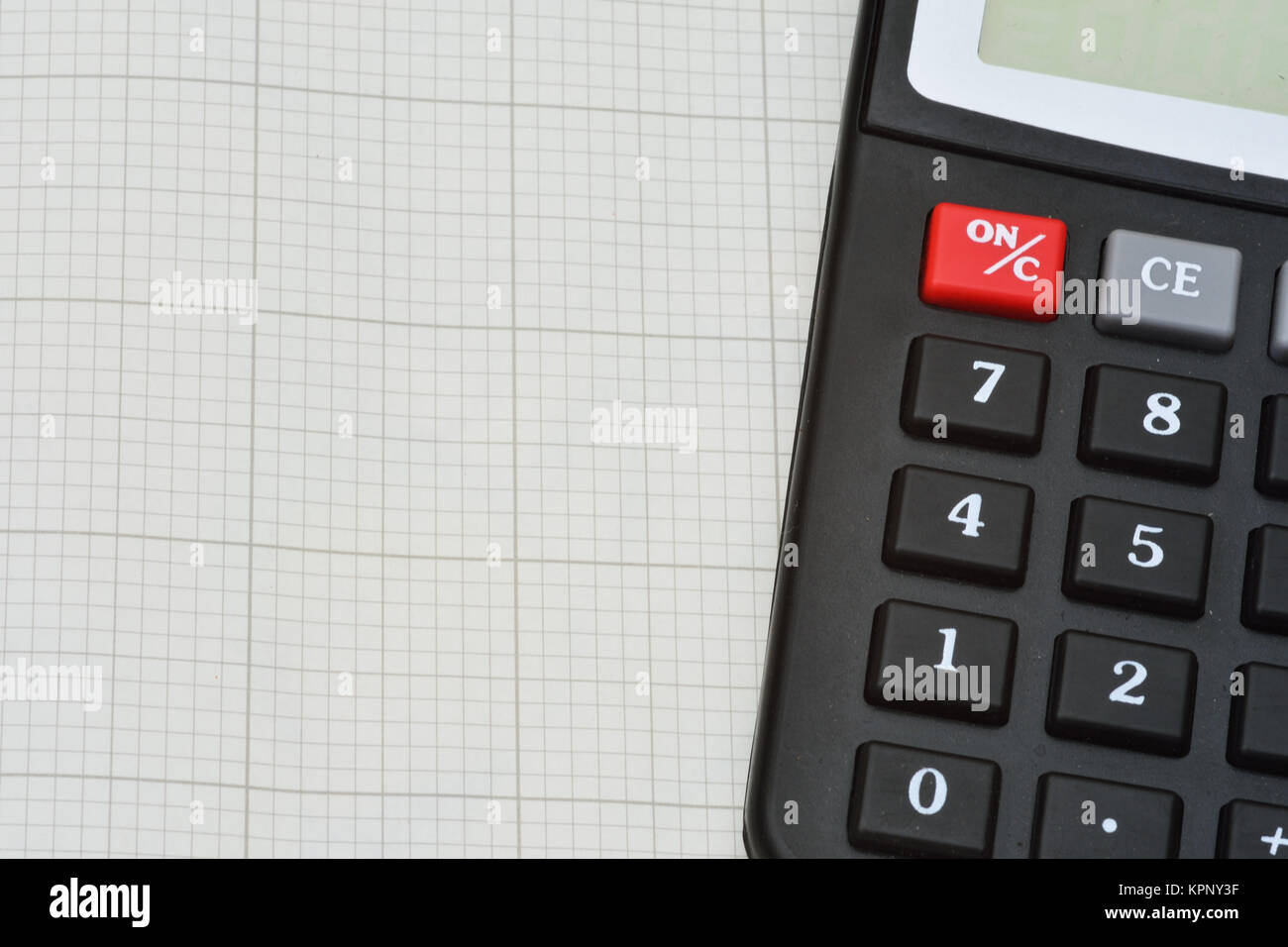 Graph paper calculator Stock Photo - Alamy