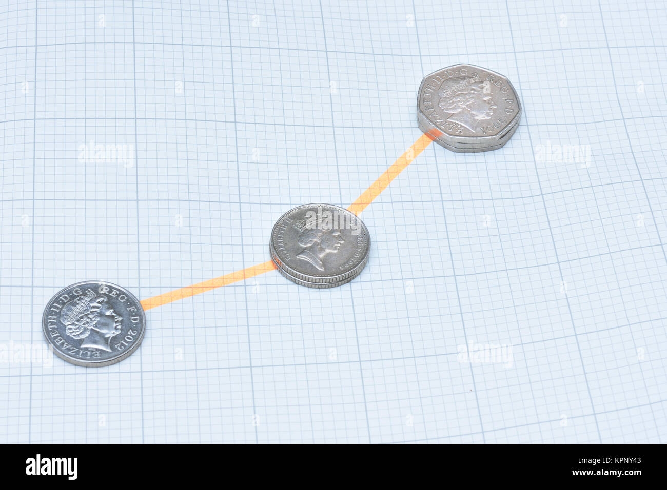 Line of coins Stock Photo - Alamy