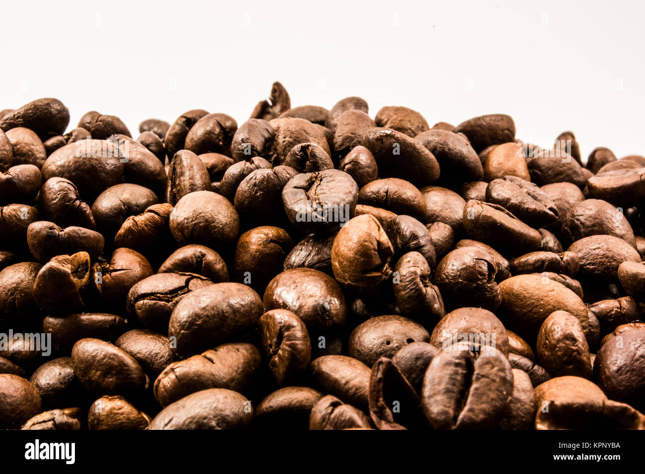 Coffee beans on white Stock Photo - Alamy