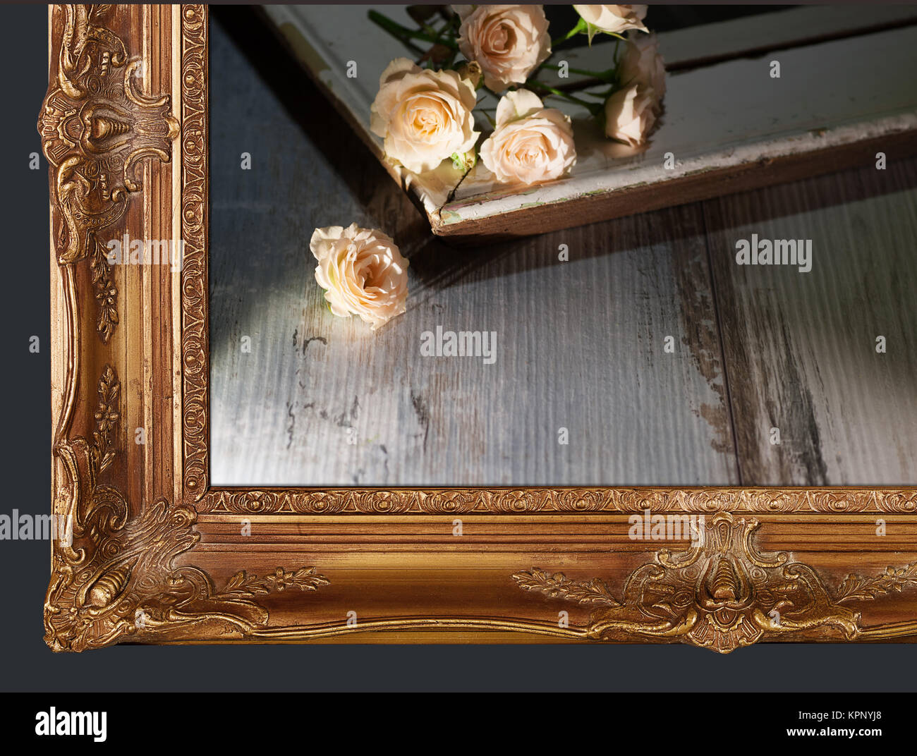 Gold picture frame with still life Stock Photo - Alamy