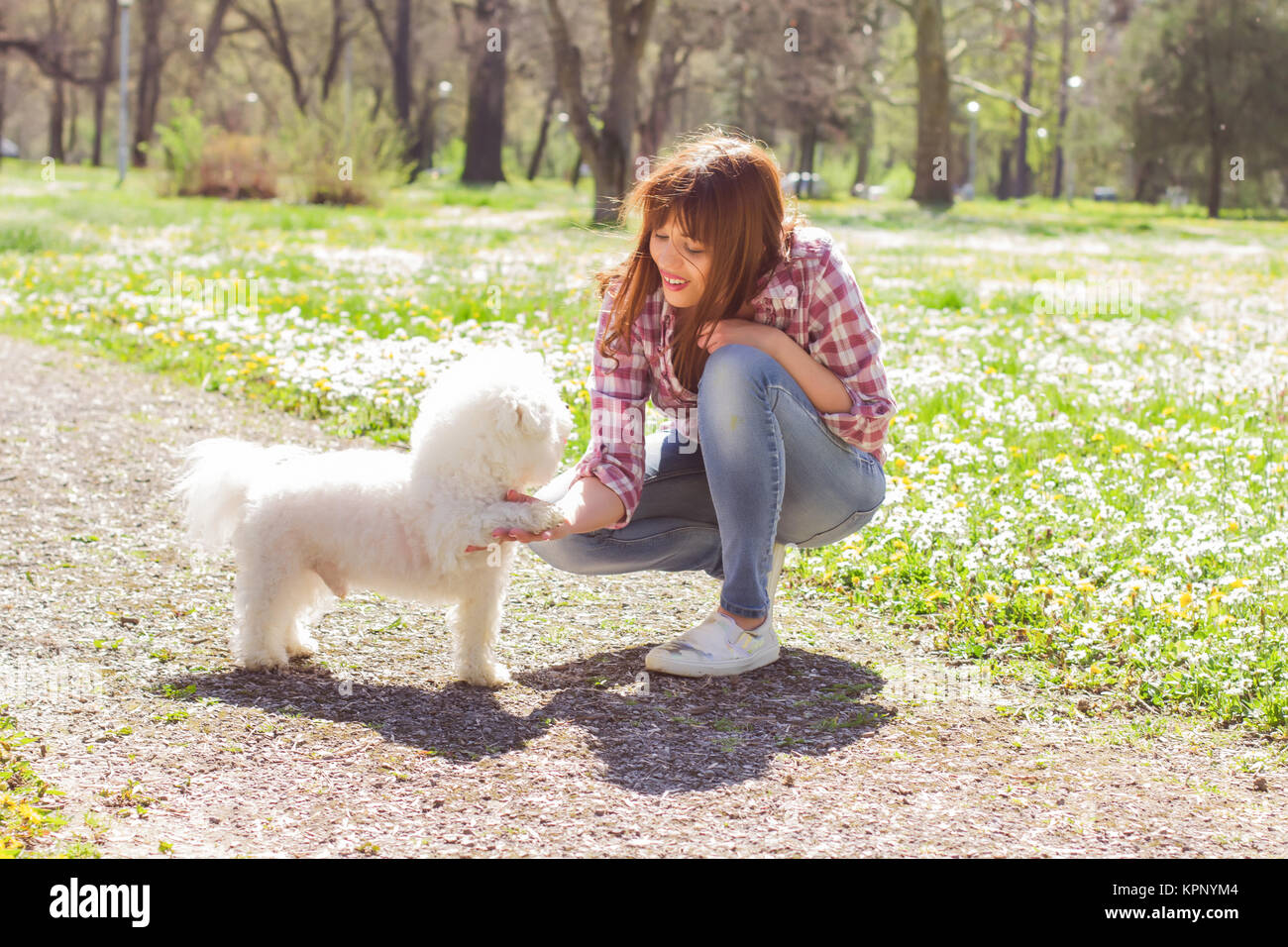 Happy Woman Enjoying Nature With Her Dog Stock Photo - Alamy