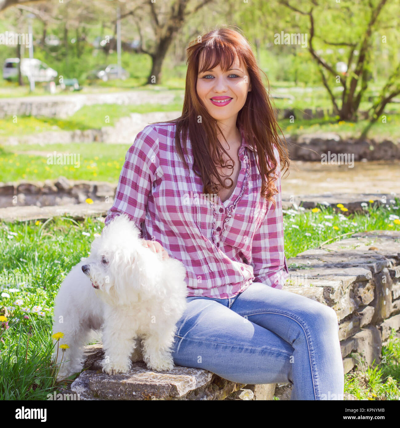 Happy Woman Enjoying Nature With Her Dog Stock Photo - Alamy