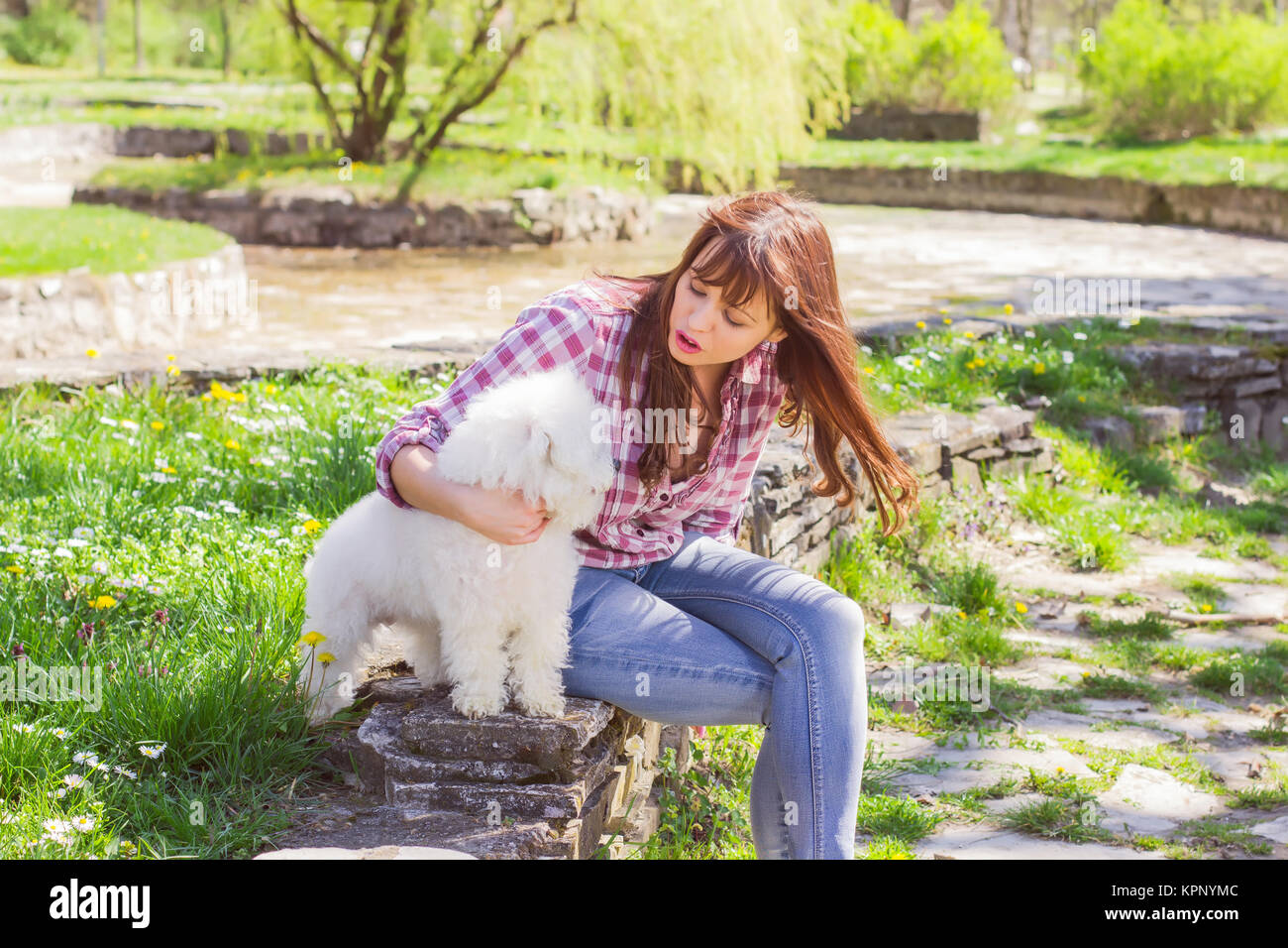 Happy Woman Enjoying Nature With Her Dog Stock Photo - Alamy