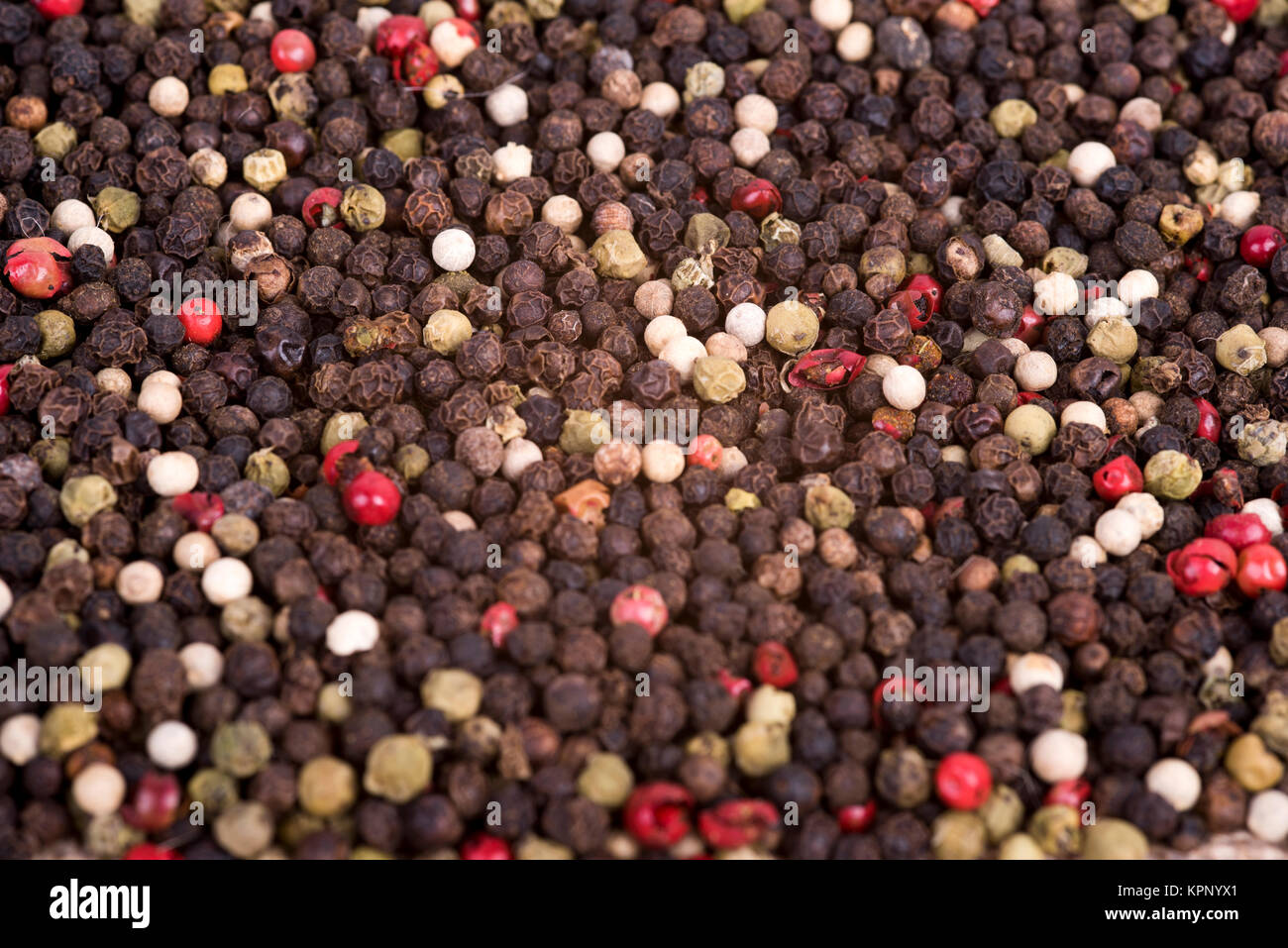 a picture of colorful peppercorns Stock Photo - Alamy