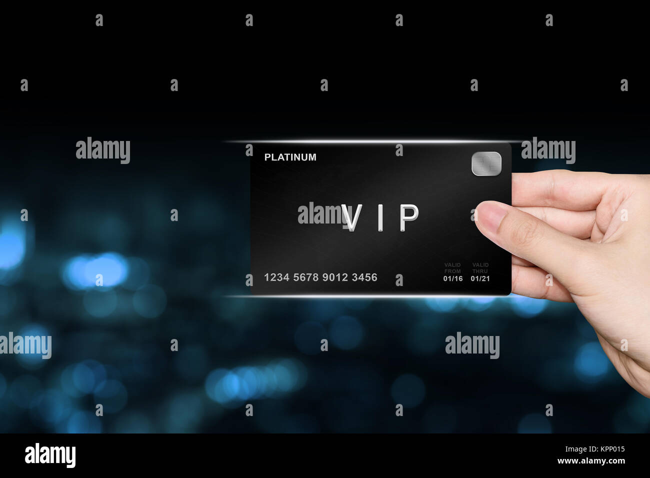 hand picking VIP or very important person platinum card Stock Photo - Alamy
