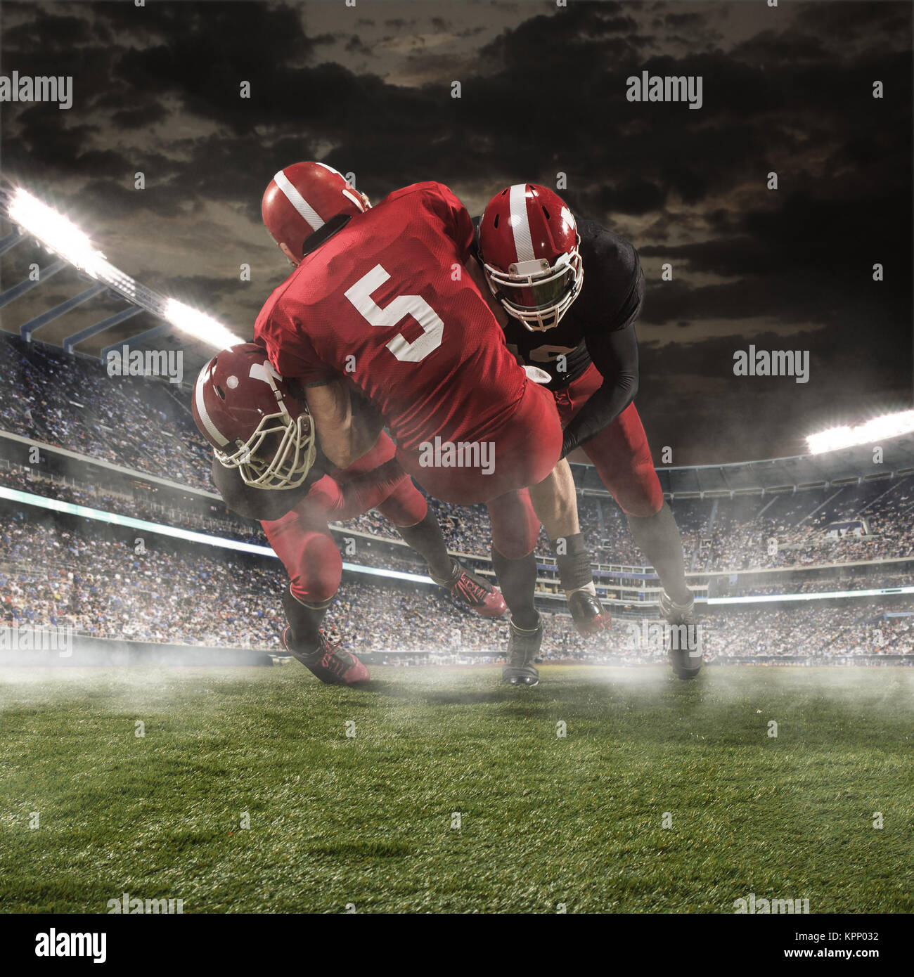 The american football players in action Stock Photo - Alamy