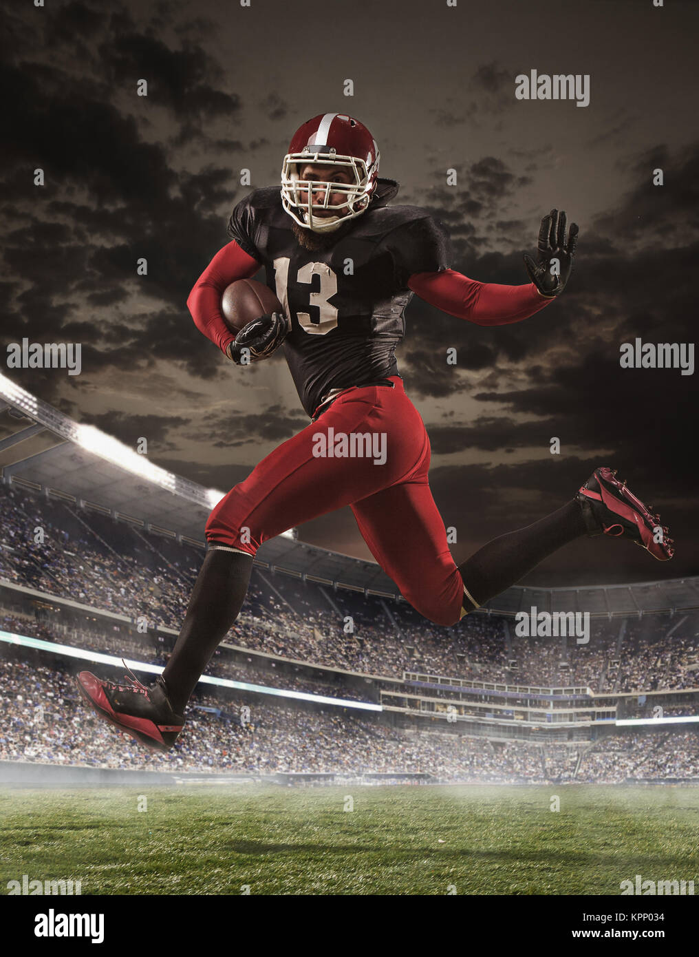 The american football player in action Stock Photo - Alamy