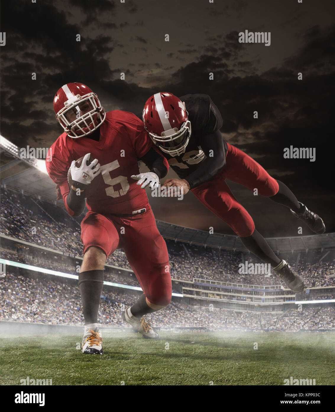 The american football players in action Stock Photo - Alamy
