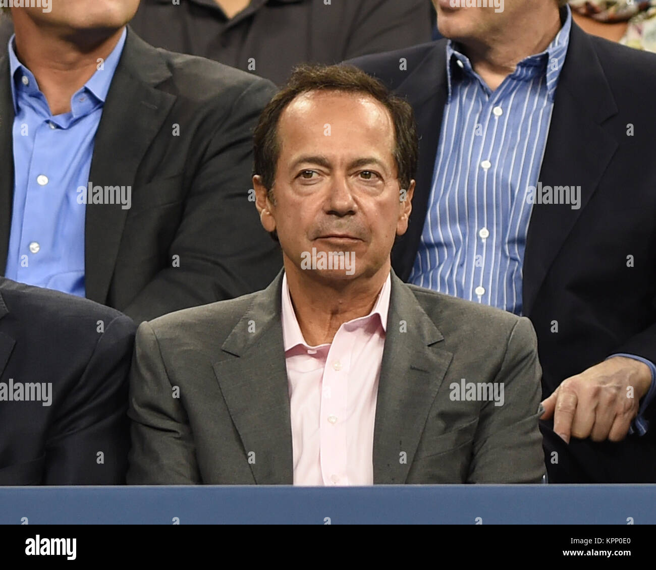 NEW YORK, NY - AUGUST 26: John Paulson watches Roger Federer of ...