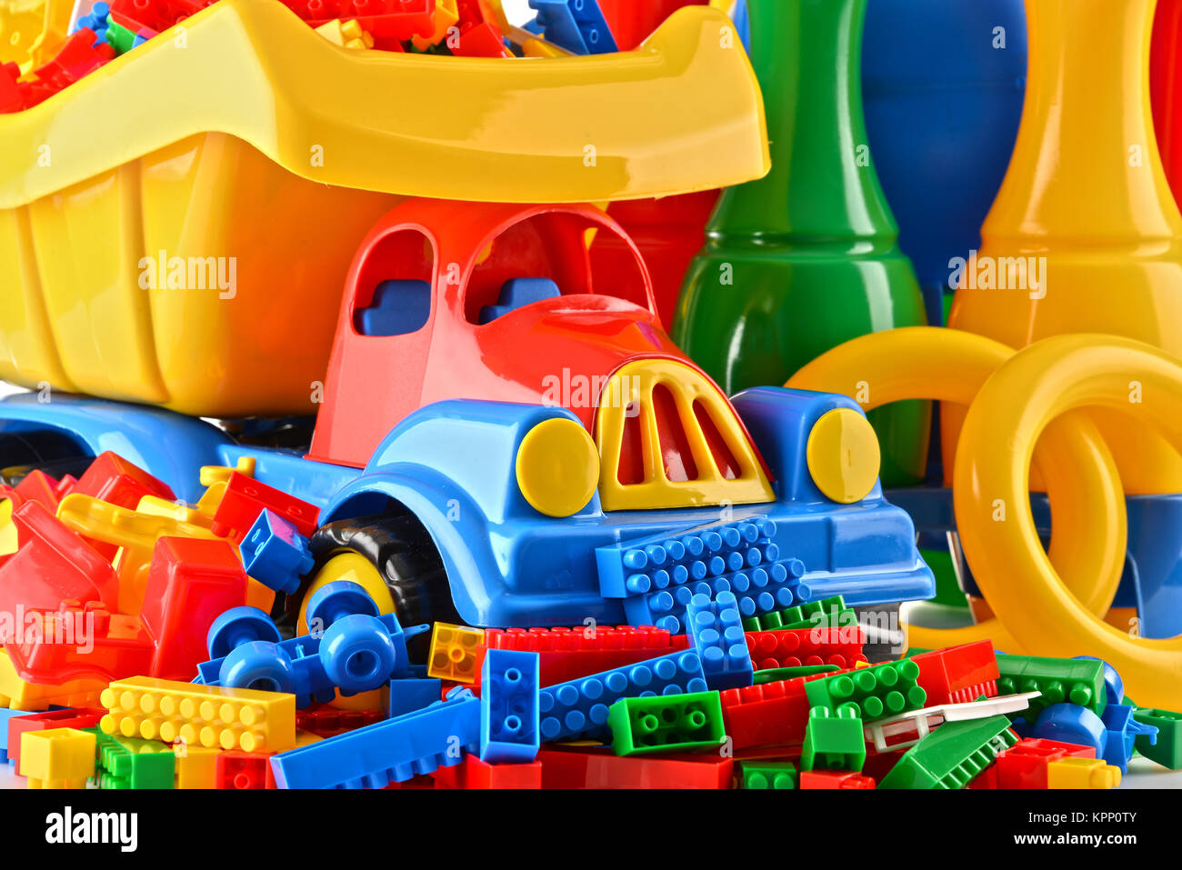 Composition with colorful plastic children toys Stock Photo - Alamy