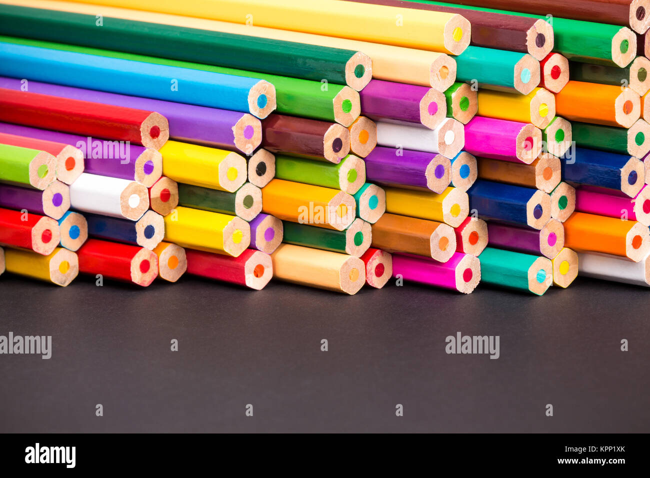 Pencil pile closeup with black copy space Stock Photo - Alamy