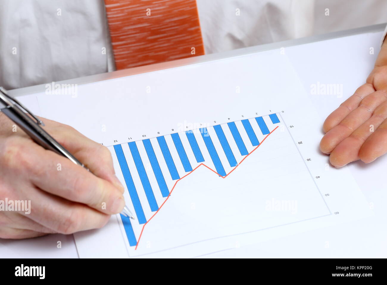 man working on graphic chart Stock Photo - Alamy