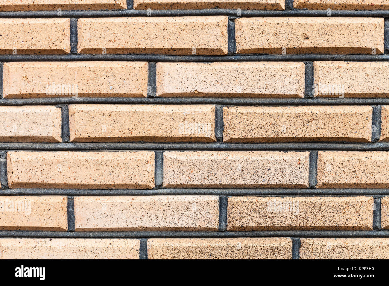 rows of yellow bricks in wall Stock Photo - Alamy