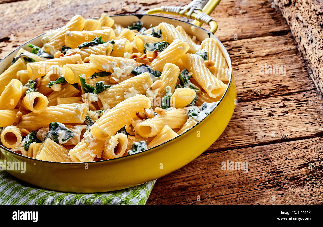 Italian ricotta pasta in a savory sauce with spinach and parmesan ...