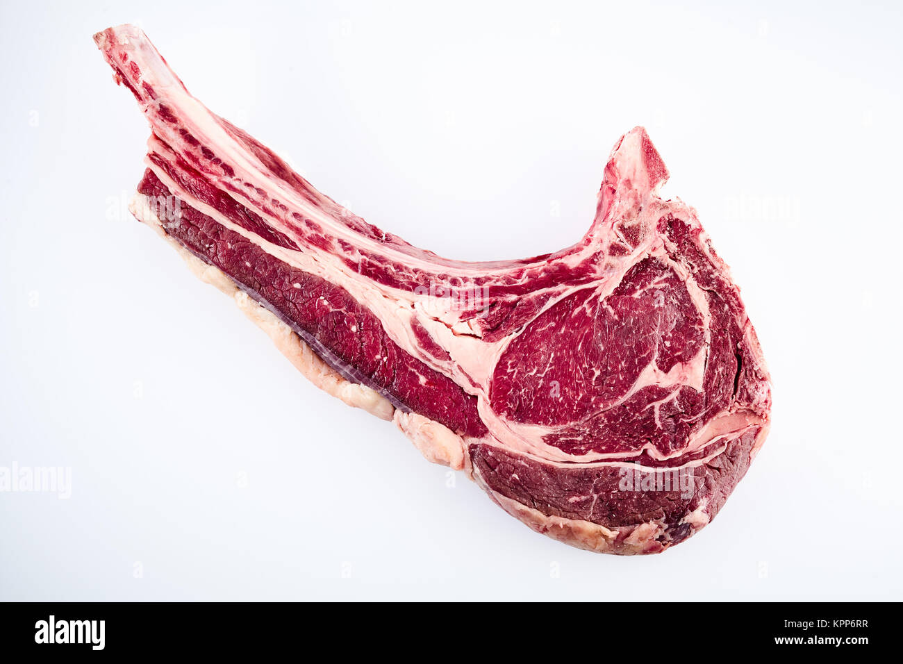 Raw tomahawk bone-in rib beef steak isolated on white ready for ...