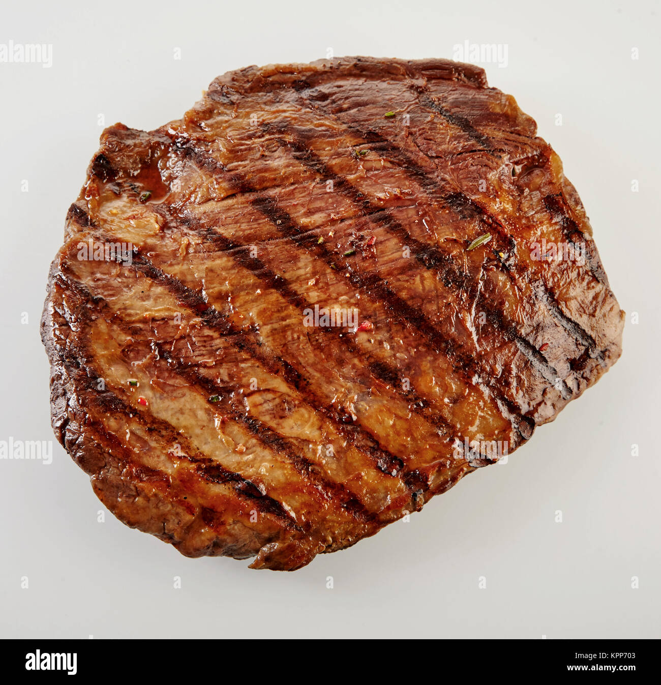 Juicy thick medallion of lean flank beef steak marinated and grilled ...