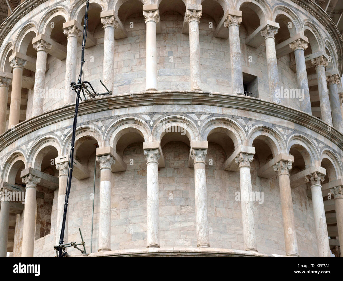 Pisa - elaborate colonnade around the legendary tower Stock Photo - Alamy