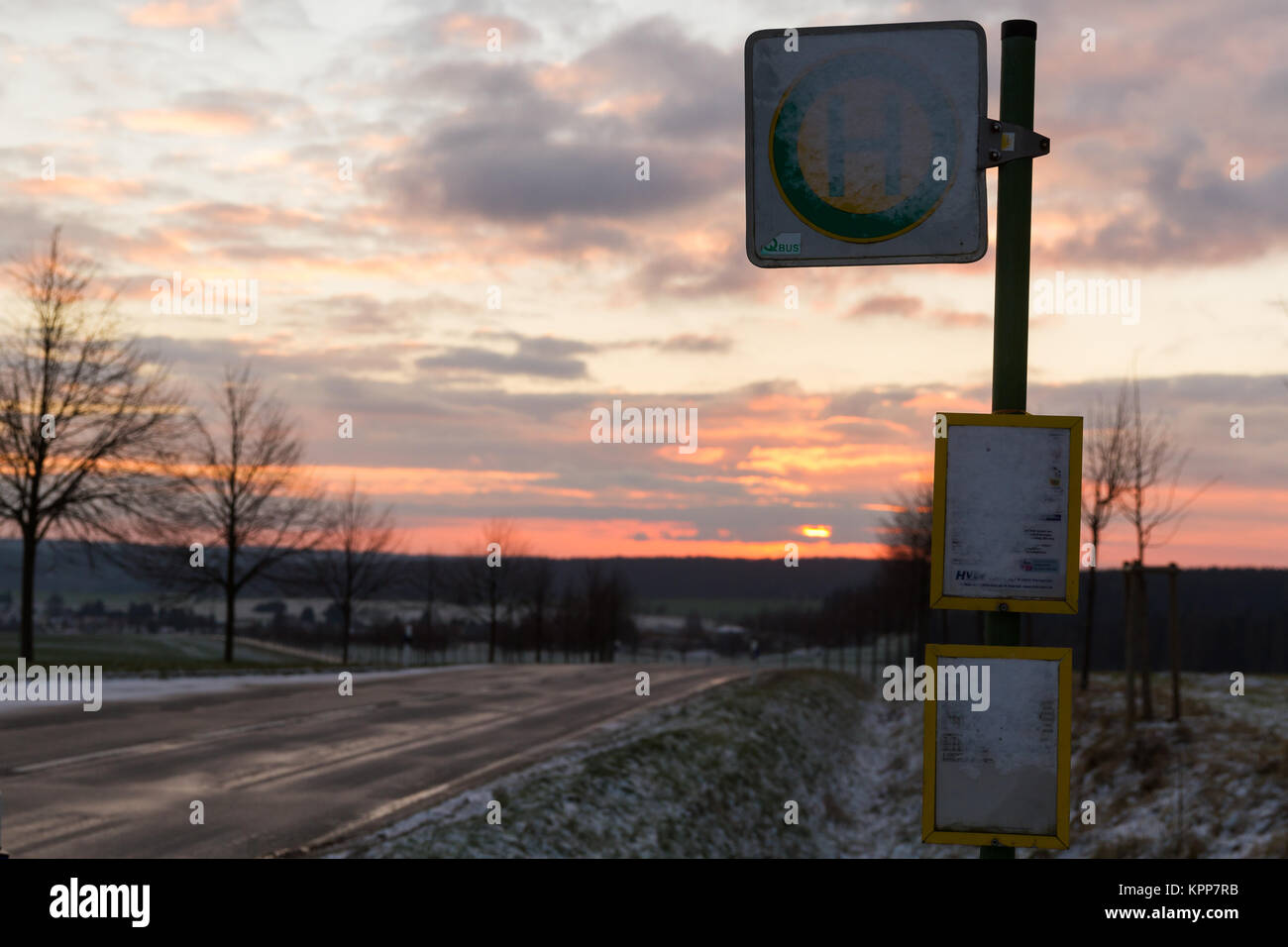 bus stop in winter with sunset Stock Photo - Alamy