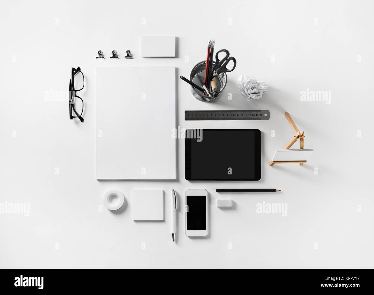 Blank corporate stationery and gadgets set on white paper background ...