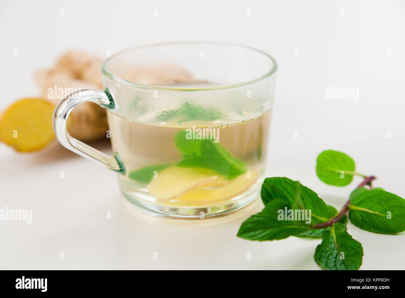 Mint Ginger Tea with white Background Stock Photo - Alamy