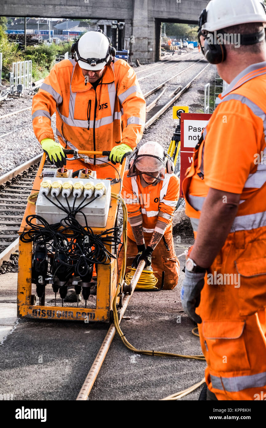 Railway construction workers Stock Photo - Alamy
