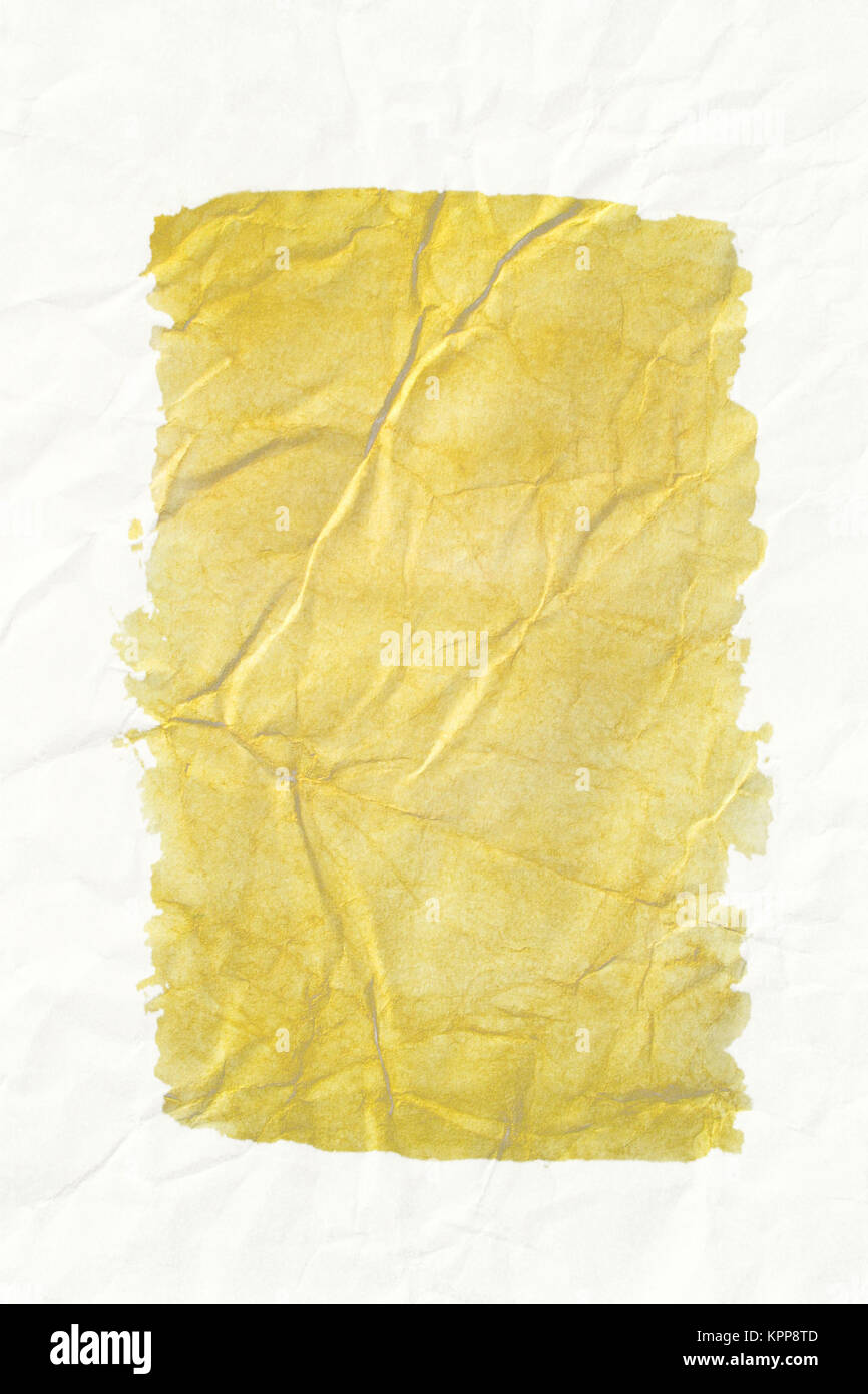yellow color painted crinkled paper Stock Photo - Alamy