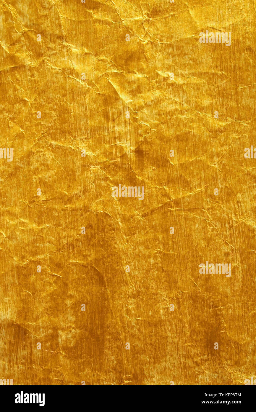 yellow color painted crinkled paper Stock Photo - Alamy