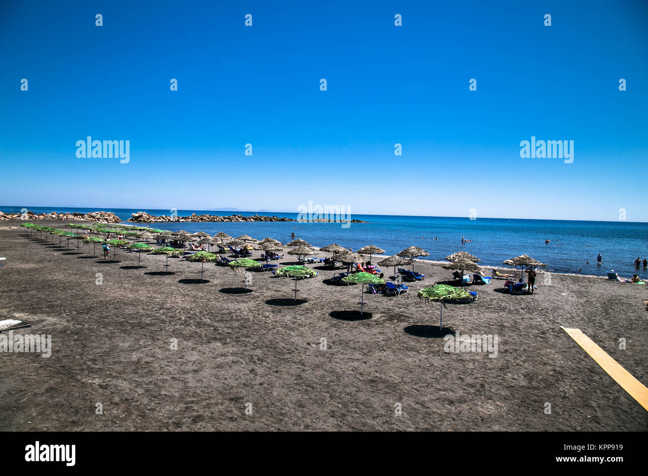 Black beach of Monolithos on Santorini, Greece Stock Photo - Alamy