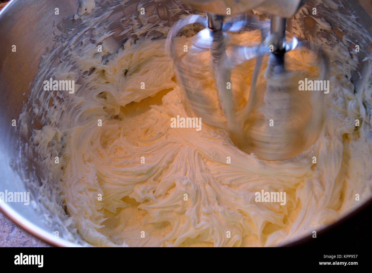Making icing in stainless hi-res stock photography and images - Alamy