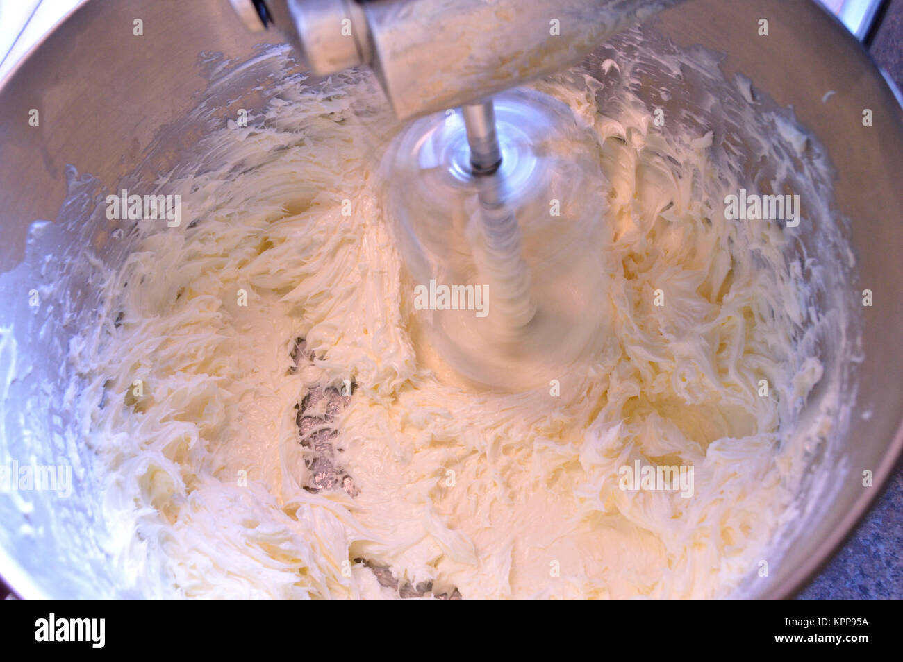 Making icing in stainless steel stand mixer Stock Photo - Alamy