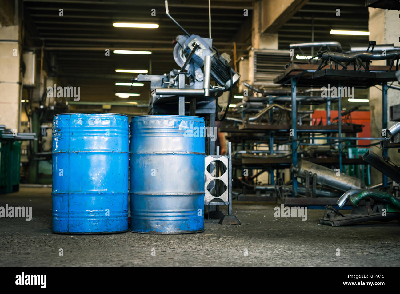 two blue industrial barrels Stock Photo - Alamy