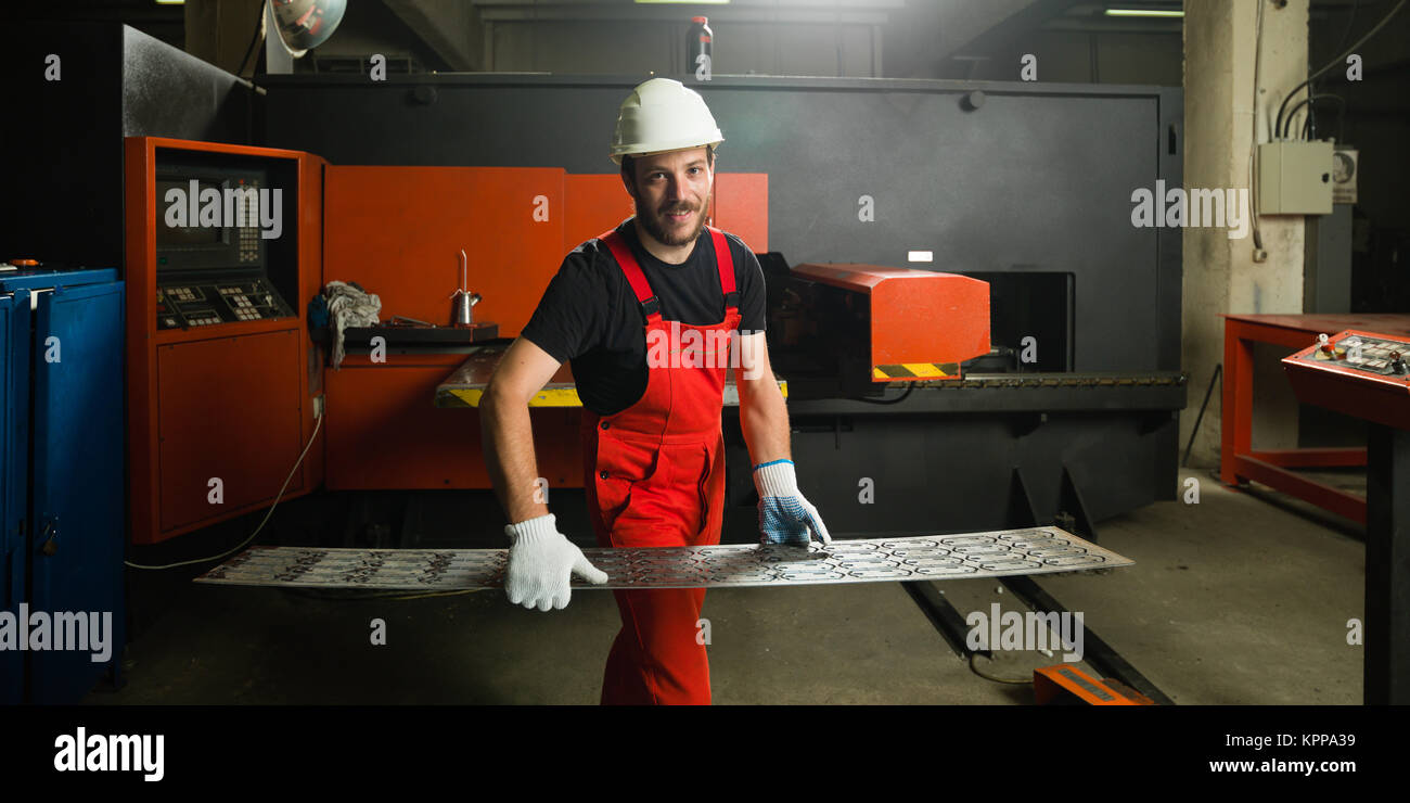 wearing red overalls Stock Photo - Alamy