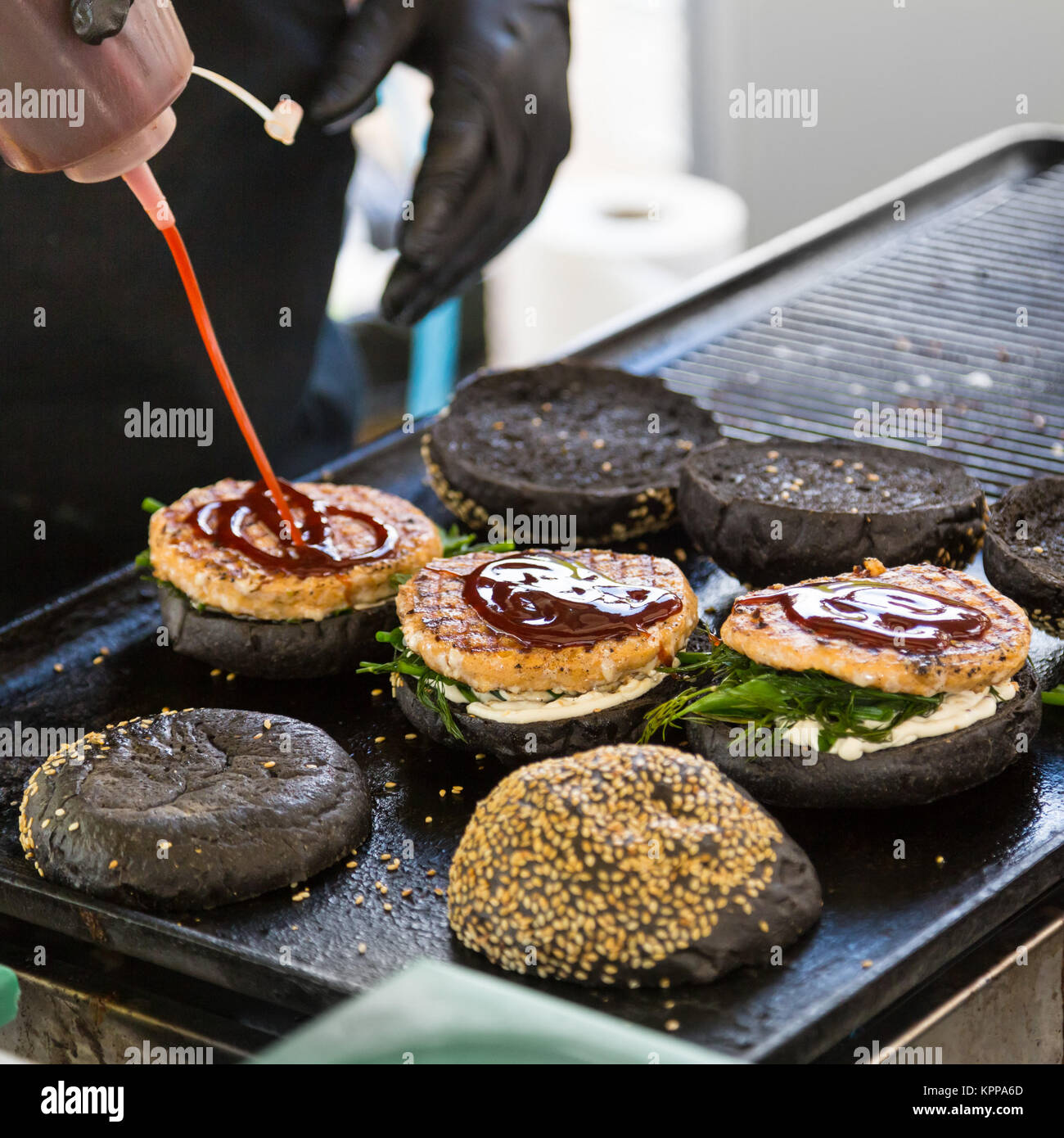 Beef burgers ready to serve on food stall Stock Photo - Alamy
