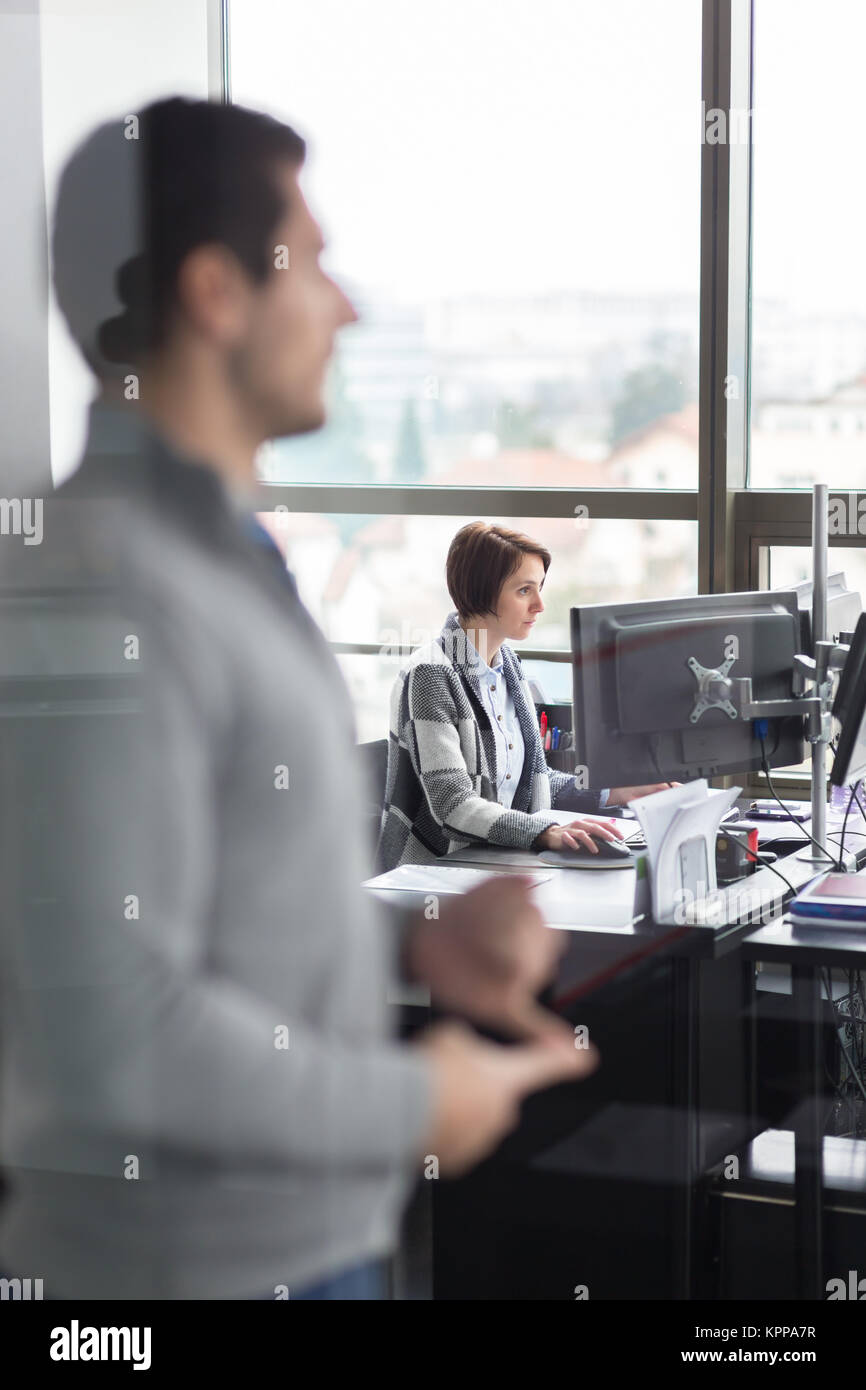Personal assistant working in corporate office Stock Photo - Alamy