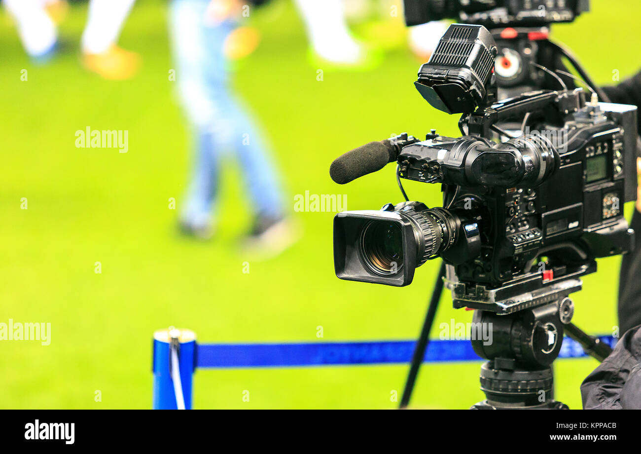 Tv camera in a soccer stadium Stock Photo - Alamy