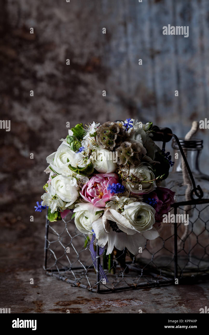 Pastel flower arrangement on rusty environment Stock Photo - Alamy