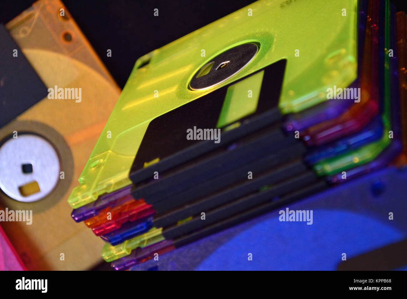 Stack of neon colored floppy disks Stock Photo - Alamy