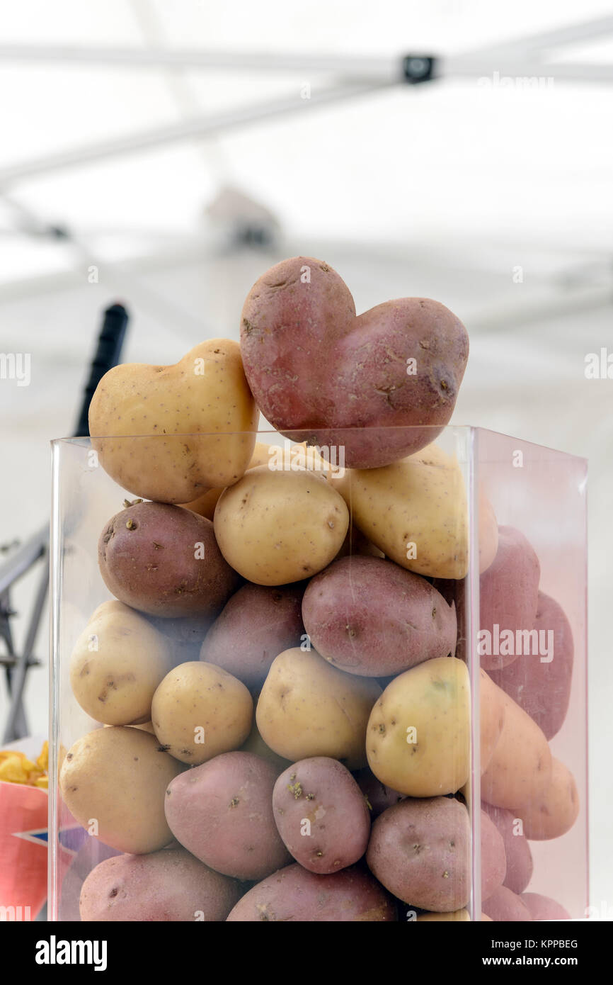 Overflowing Basket of Potatoes Stock Photo - Alamy