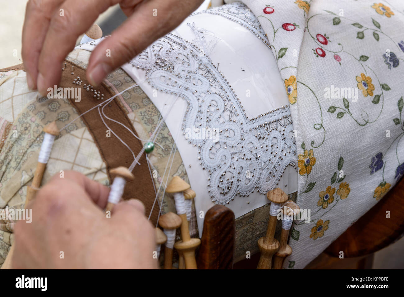 Bobbin Lace Hands at Work Stock Photo - Alamy