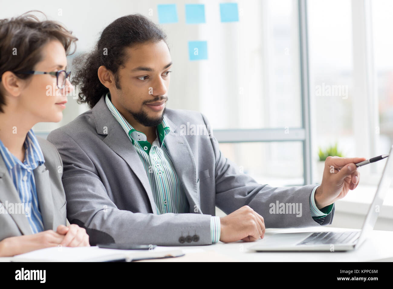 Young businessman explaining business strategy hi-res stock photography ...